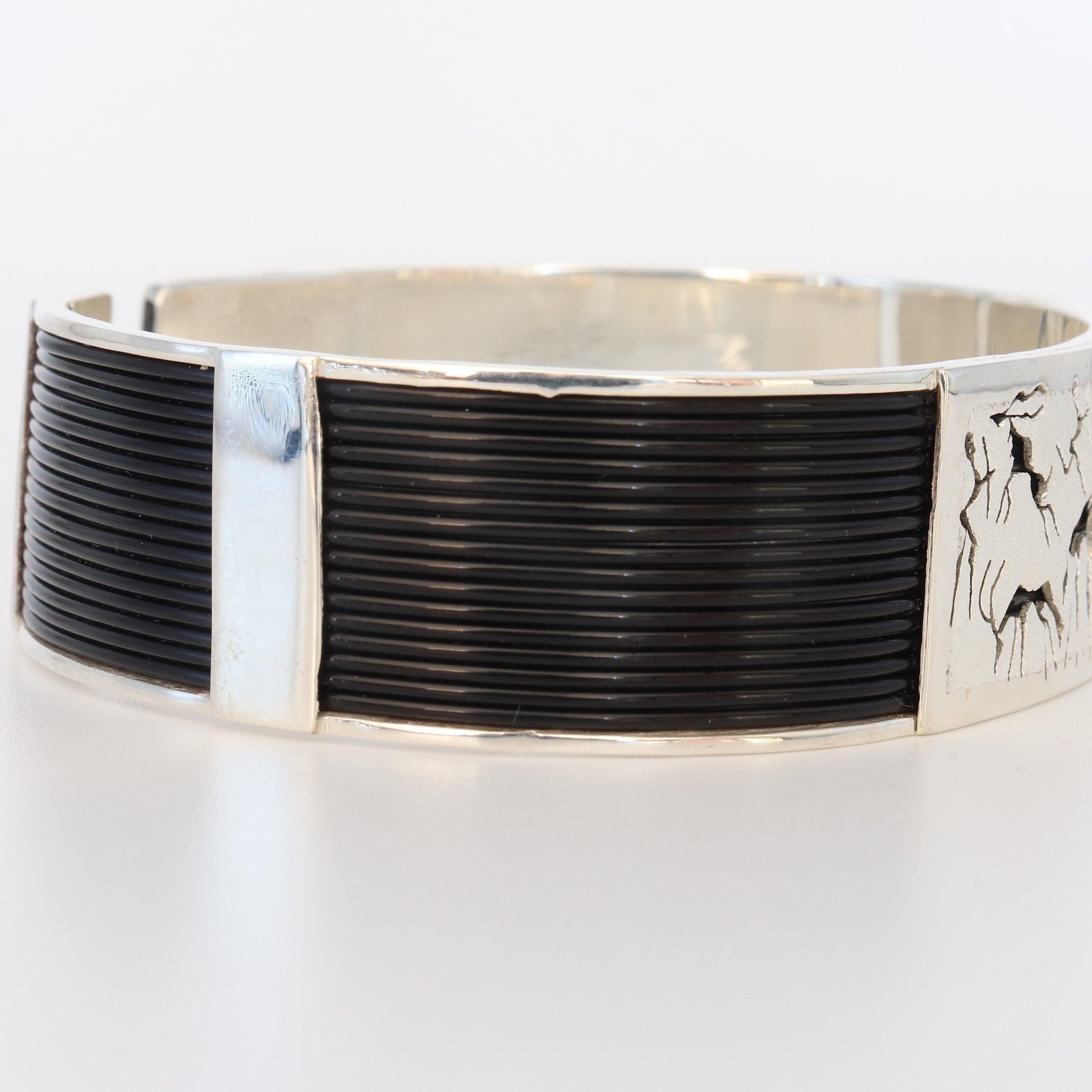 Silver elephant hair with rock-art giraffe and bushmen. - Cape Diamond ...