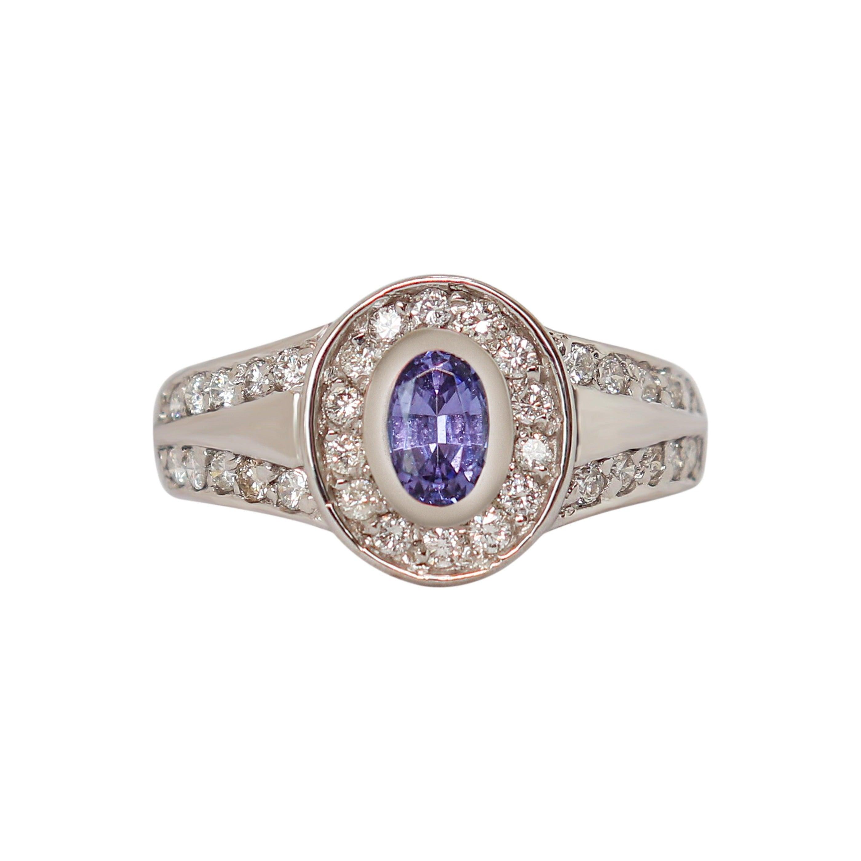White Gold Tube-set Oval Tanzanite and Channel-set Diamond Dress Ring