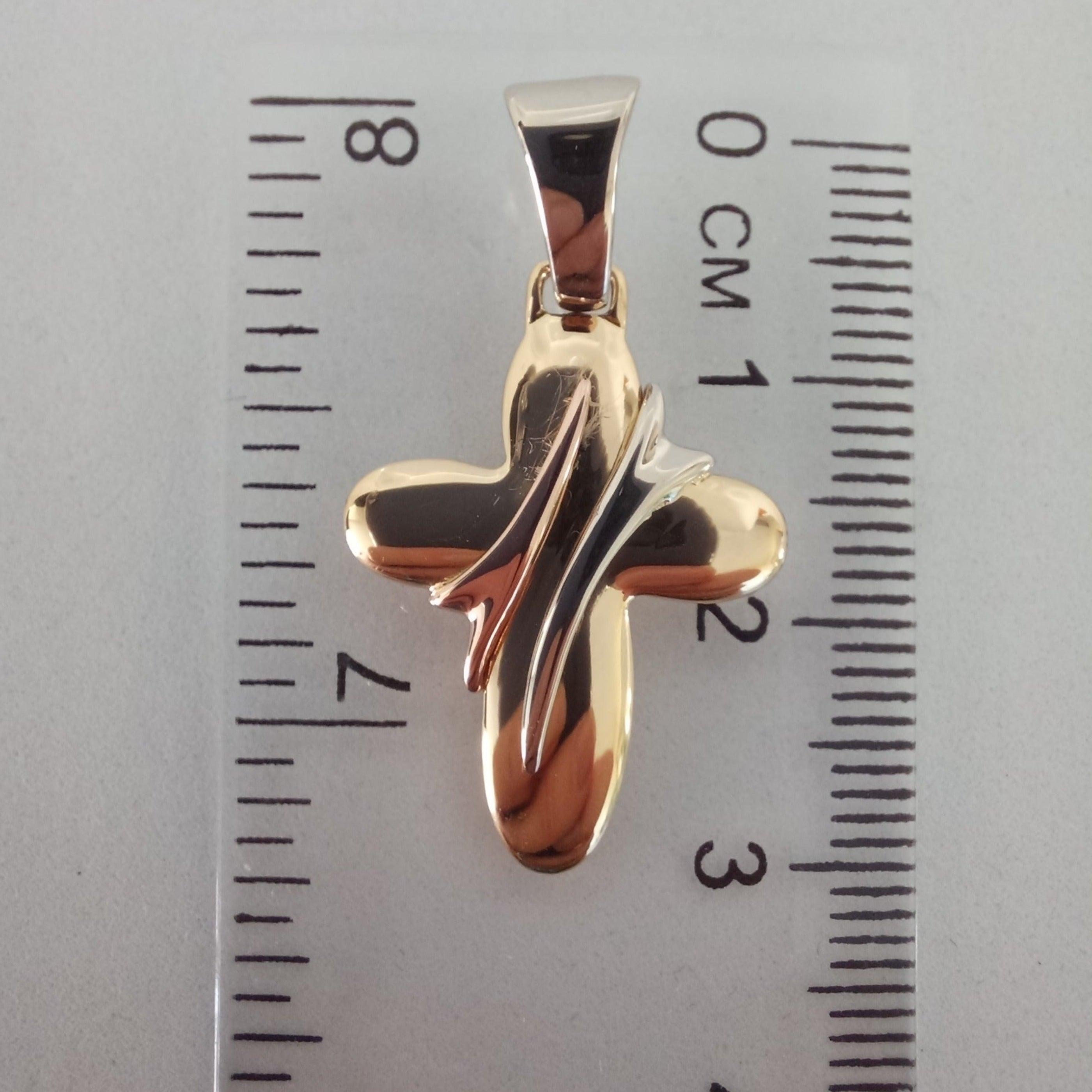 Gold cross pendant with elevated streaks